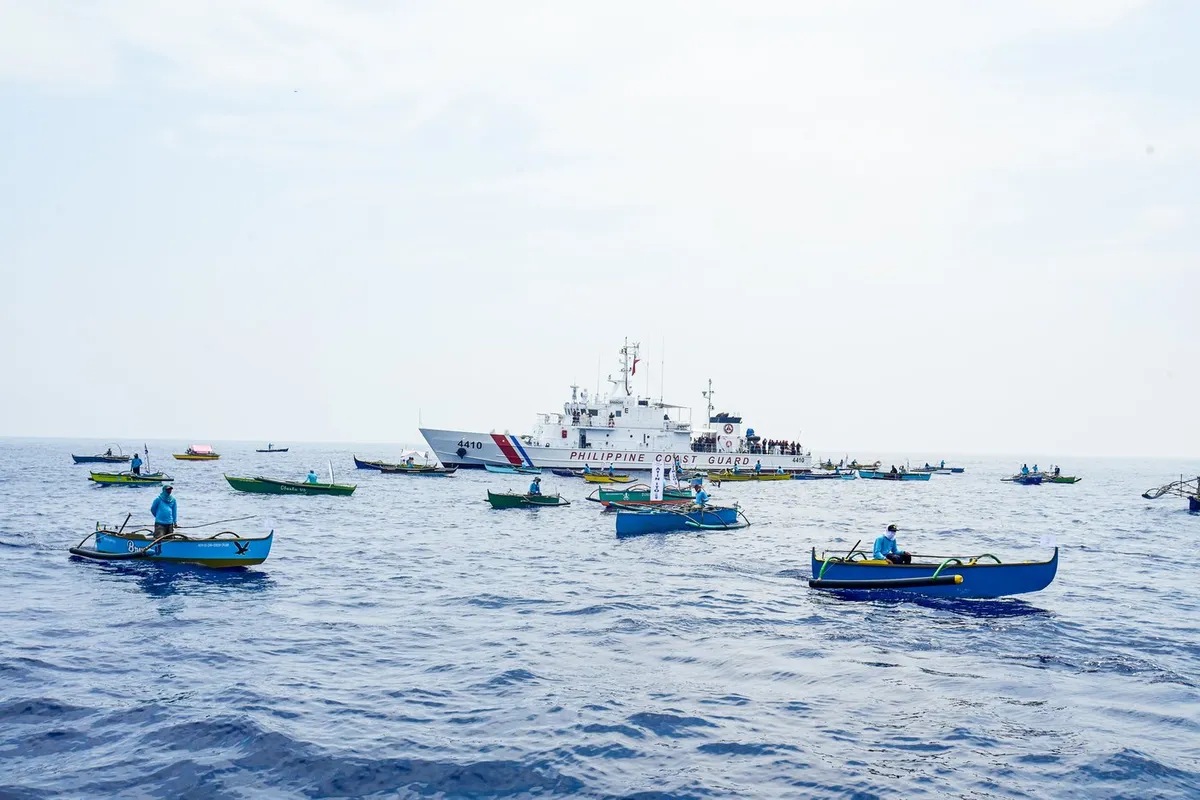 PCG encouraging more Filipino fishermen to cast nets in Rozul Reef as ...