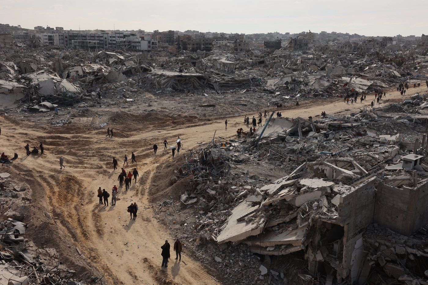 After celebrations, displaced Gazans return home to destruction | ABS ...
