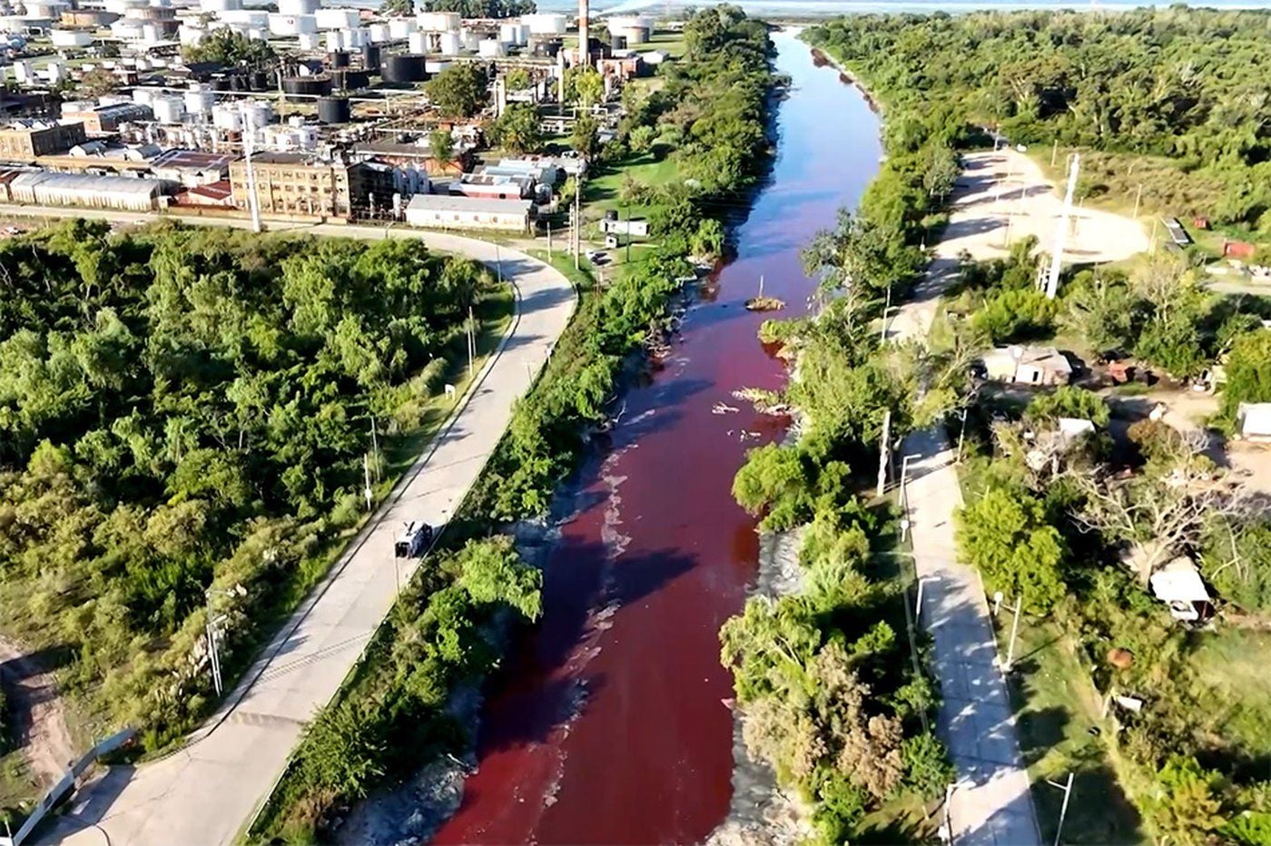 Unknown contaminant turns Argentine river blood red | ABS-CBN News
