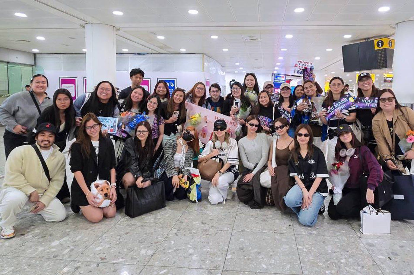 LOOK: BINI arrives in London, receives warm welcome from Blooms | ABS ...