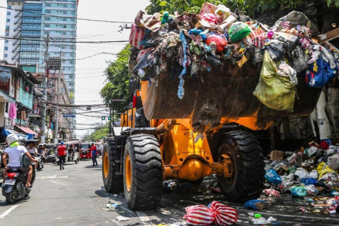 Manileños feel the difference as garbage collected from city’s roads ...