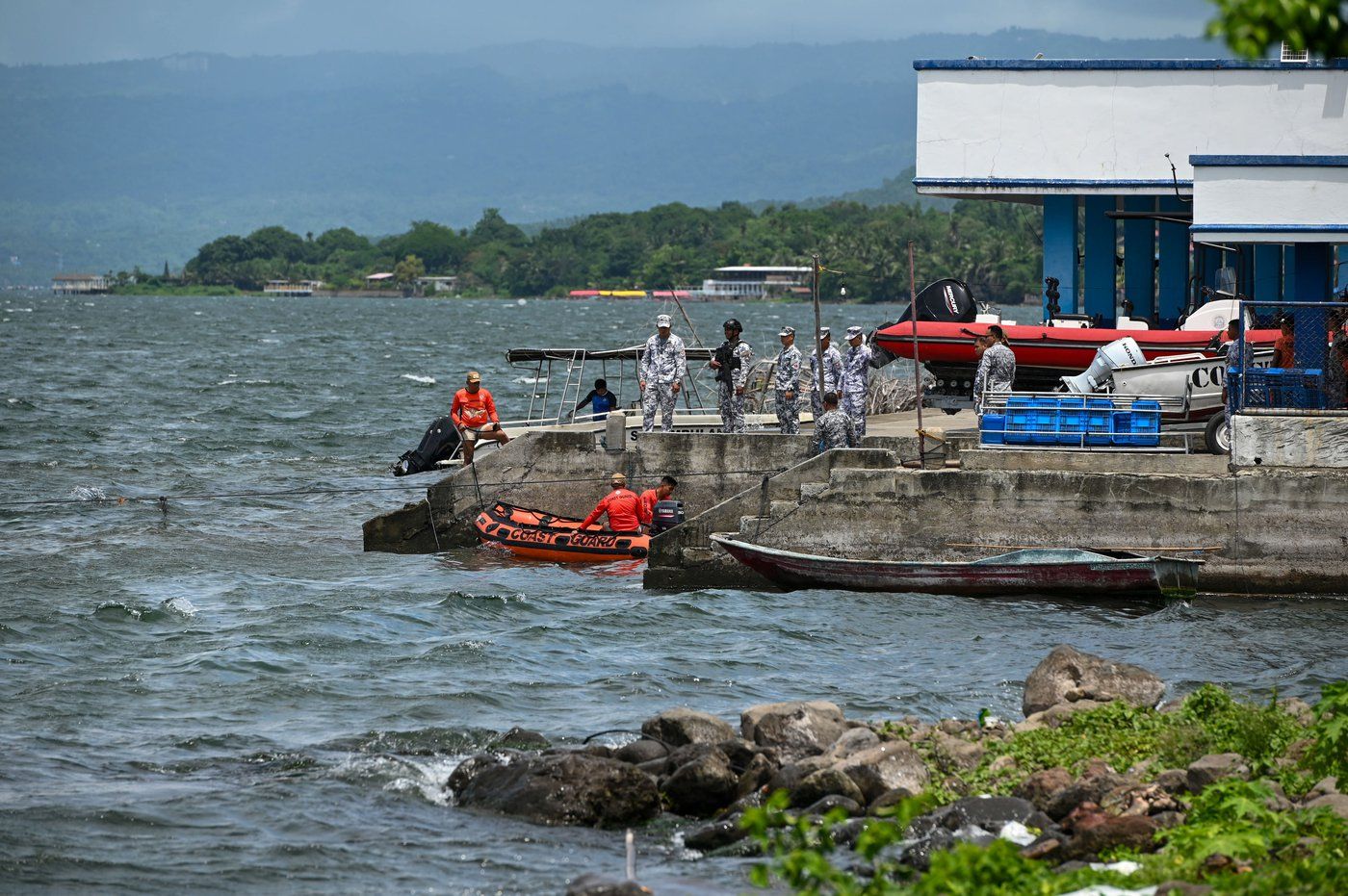 Sacks of bones found in Taal Lake weighed down with rocks — PCG | ABS-CBN News