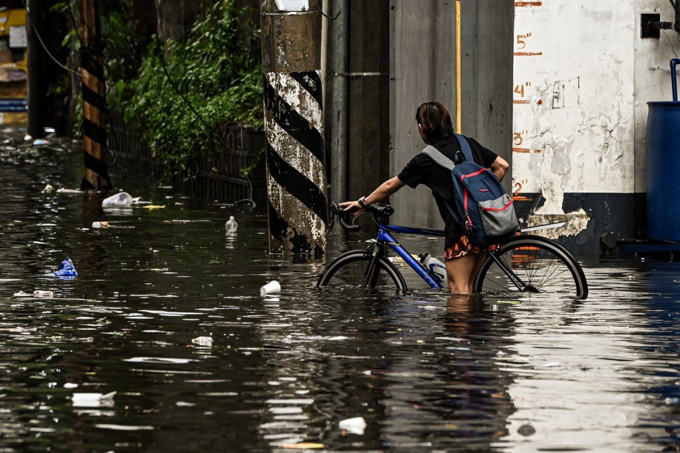 Heavy rains cause flooding in parts of Quezon City, Malabon | ABS-CBN News