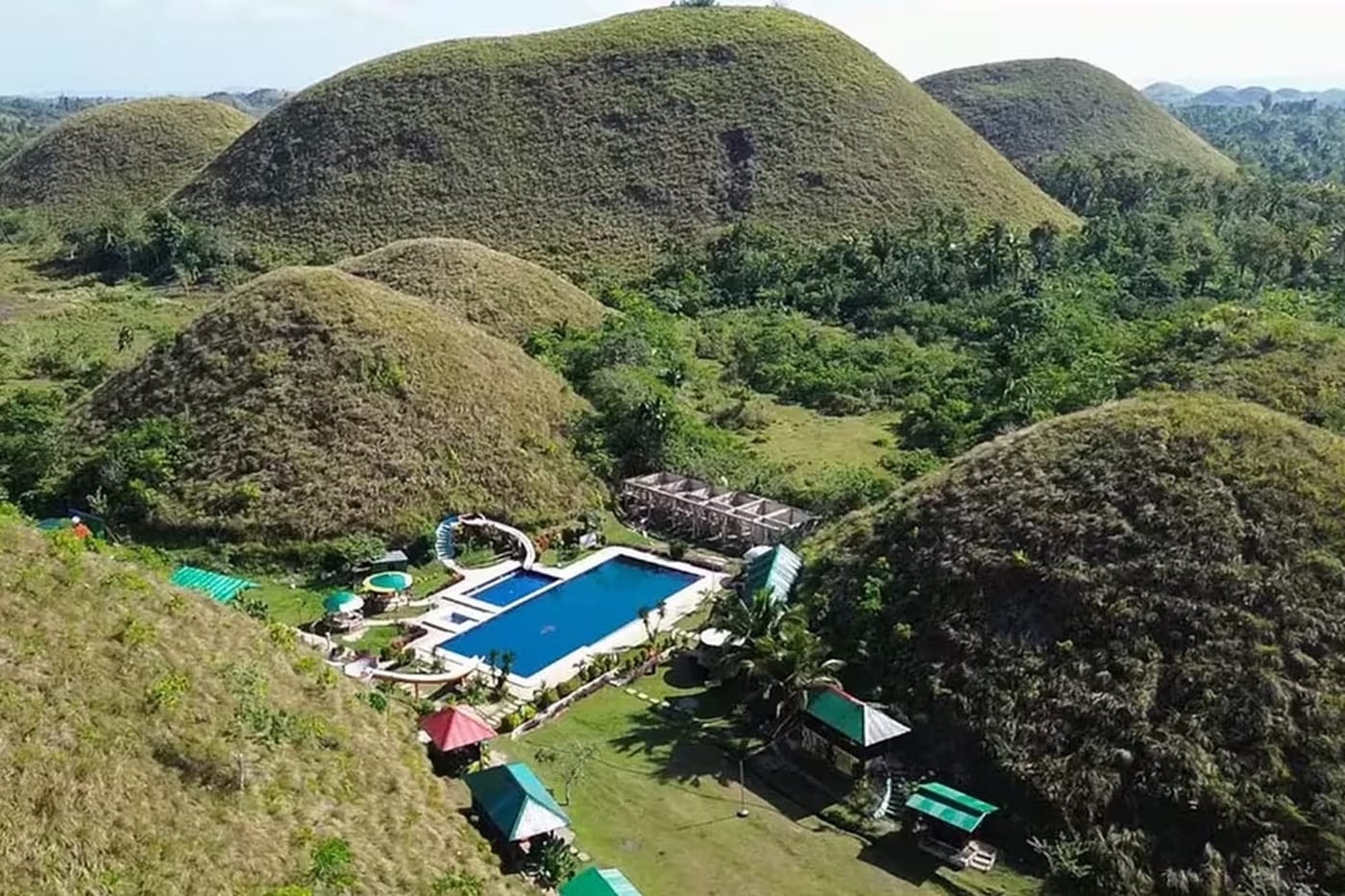 Ombudsman sacks Bohol mayor, DENR director for resort built on ...