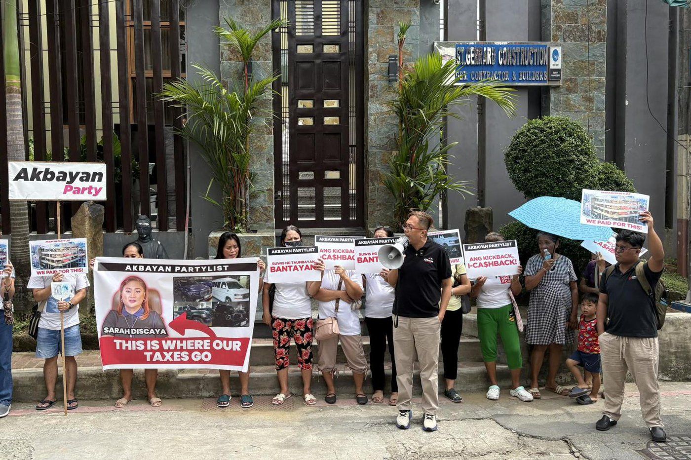 Akbayan pickets Discayas' St. Gerrard firm over flood control projects ...