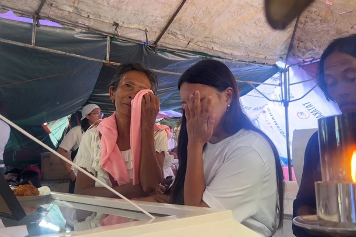 11 quake victims laid to rest, families cry in pain | ABS-CBN News