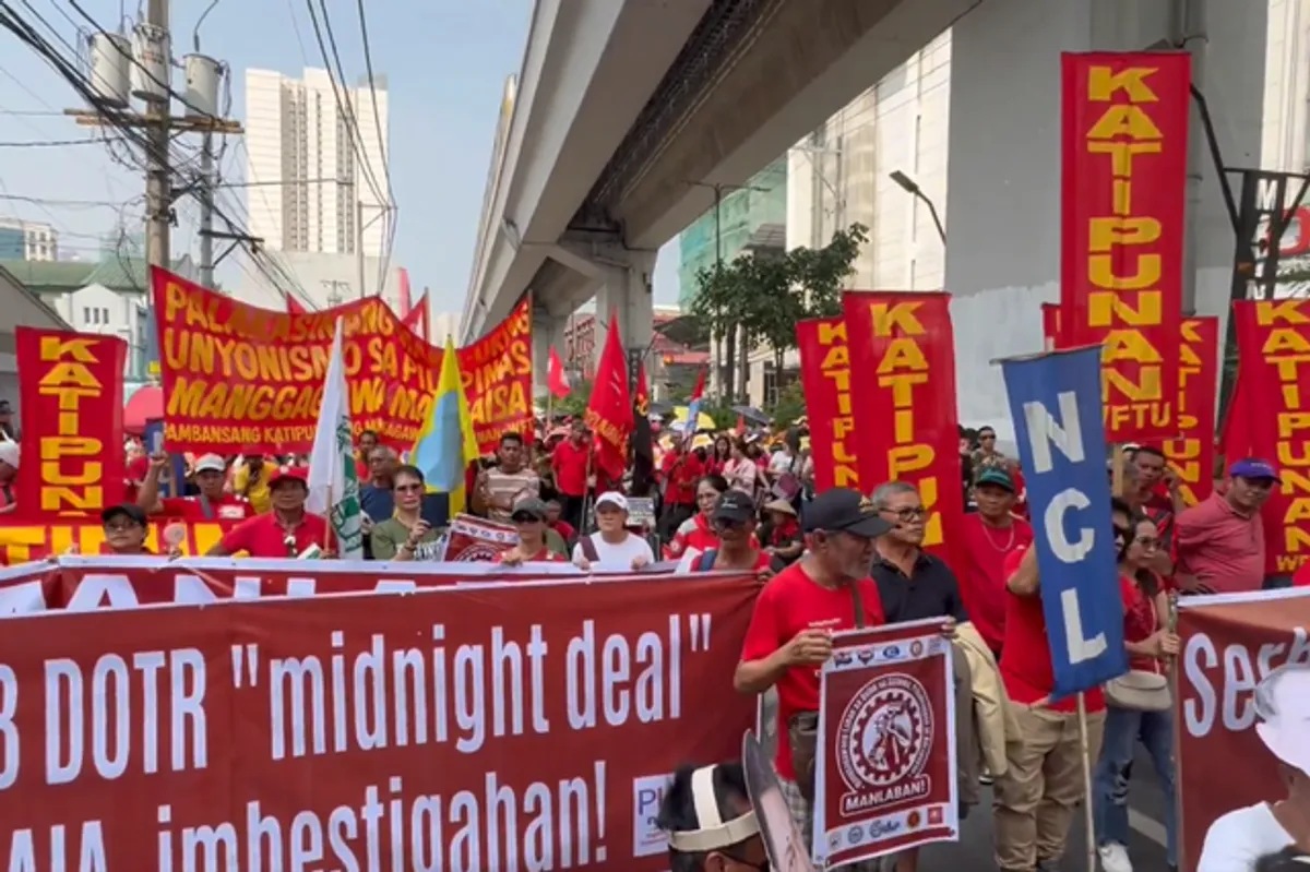 Labor groups hold Manila protest vs corruption, job contractualization ...