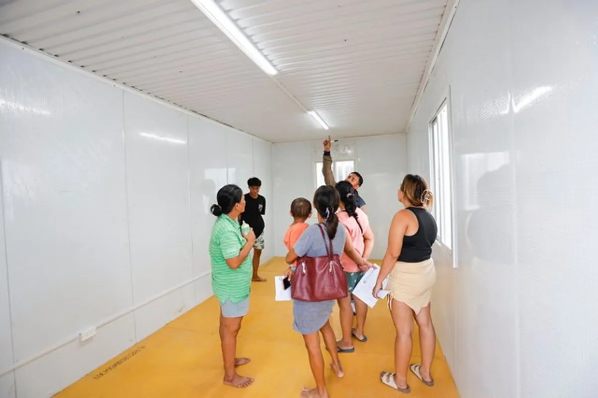 Typhoon Tino victims in Mandaue move in to prefab homes on Christmas ...